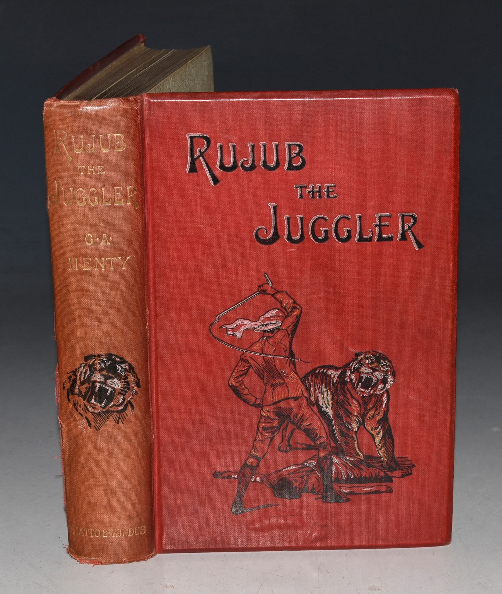BIBLIO | Rujub, The Juggler. by HENTY, G. A.: | | | London, Chatto ...