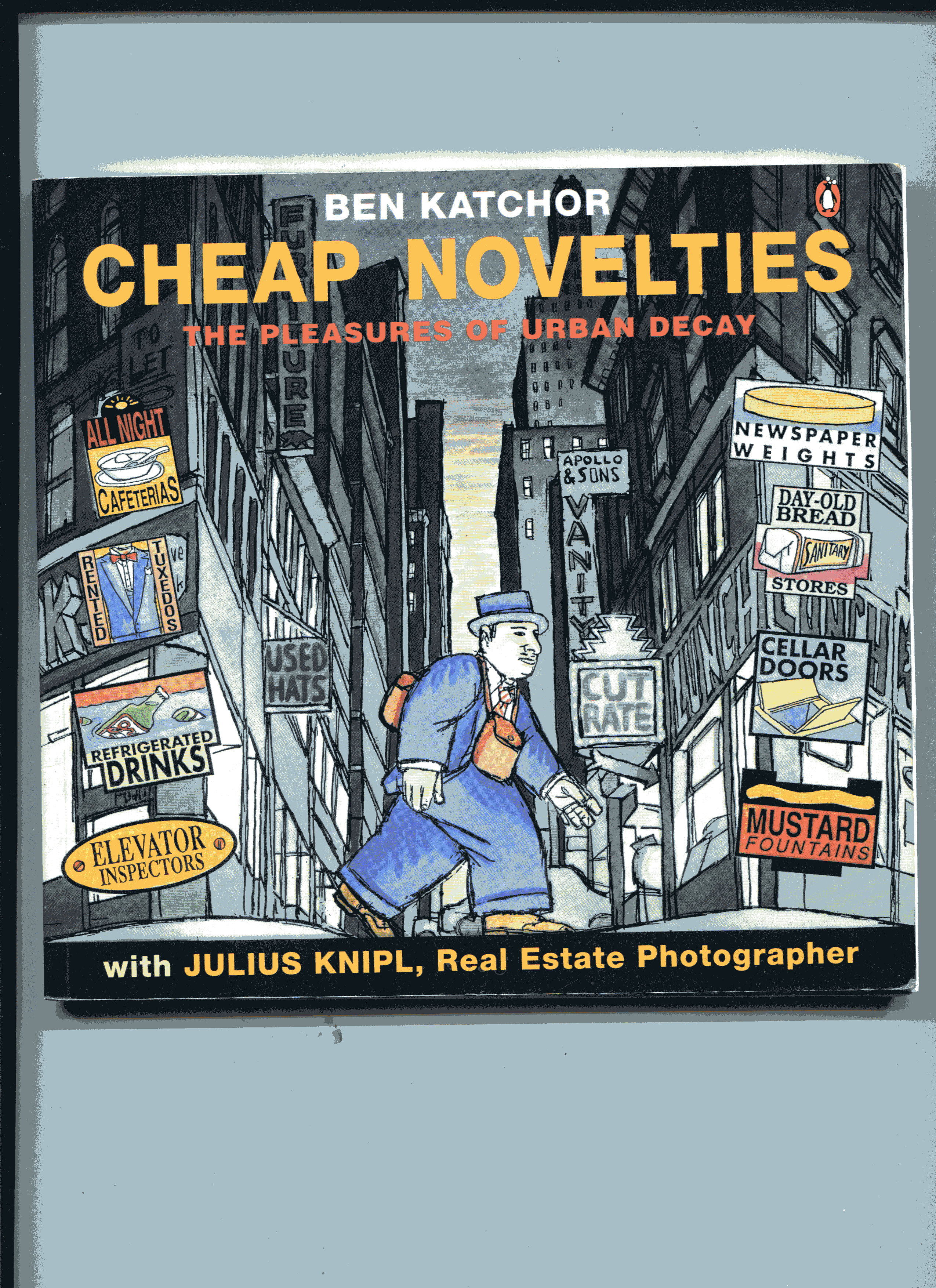 CHEAP NOVELTIES The Pleasure of Urban Decay with Julius Knipl Real Estate Photographer by Katchor Ben Soft cover 1991 Penguin A Raw One Shot 9780140159974 BIBLIO