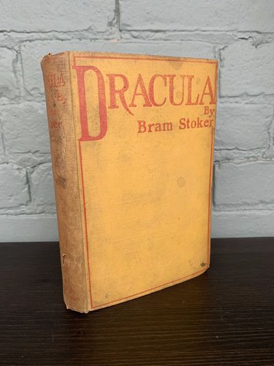 Dracula by Bram Stoker | Remarkably light foxing, corners bumped, with original yellow cloth ...