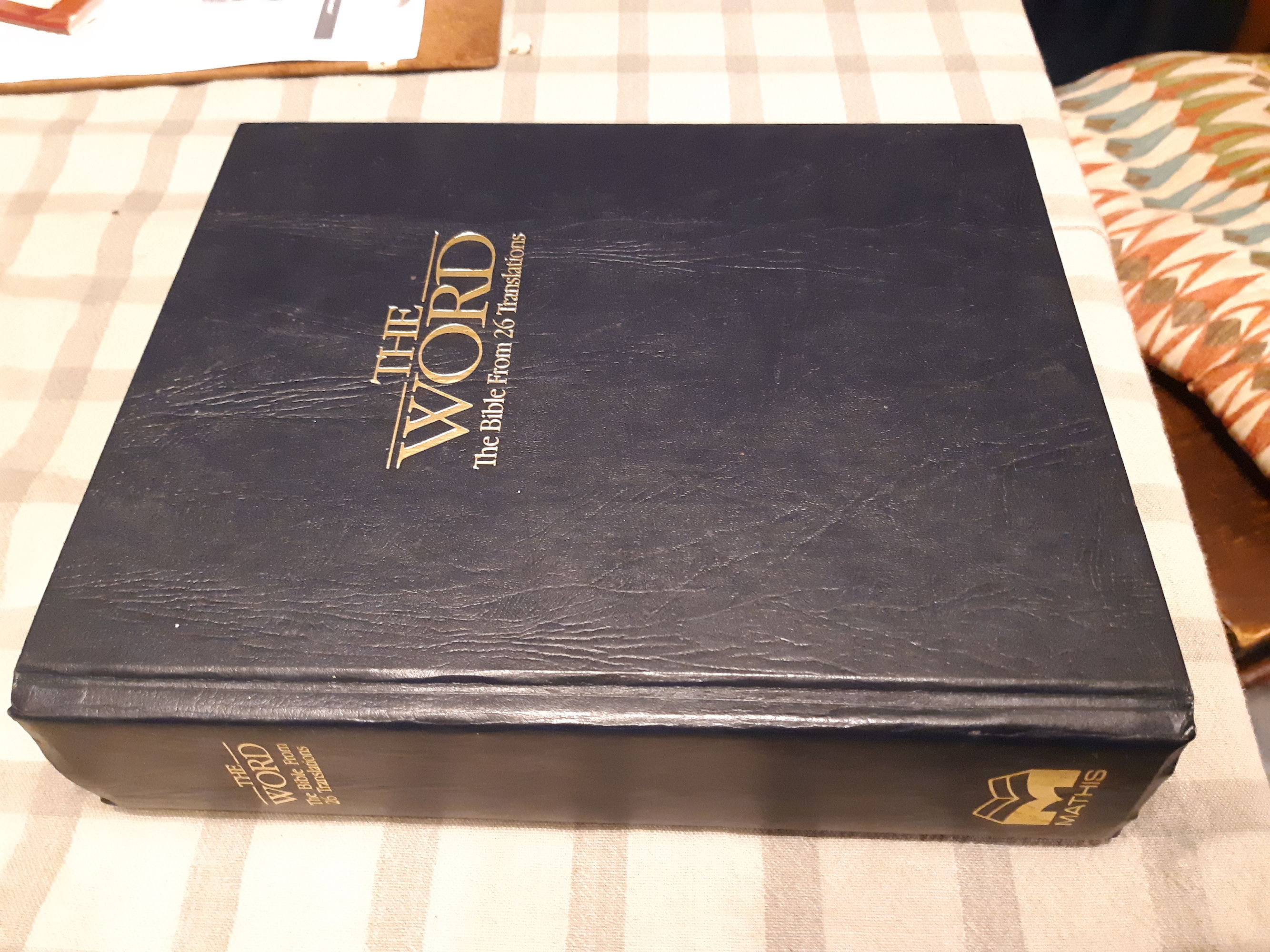 THE WORD; the Bible Navy blue leather with gold imprint on cover and ...